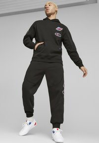 Puma BMW M MOTORSPORT STATEMENT - Tracksuit bottoms - black - Zalando.de