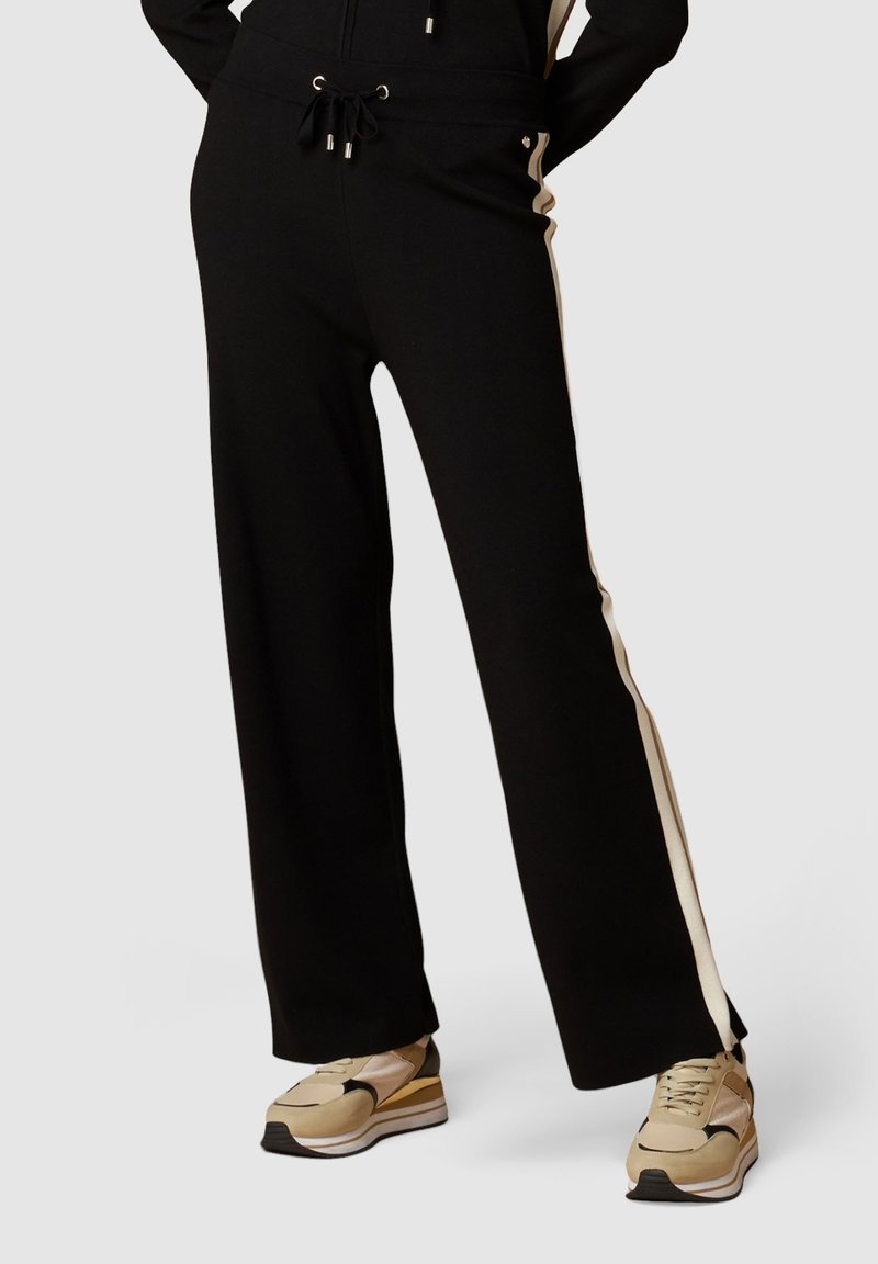 Oltre Jogginghose - nero/schwarz - Zalando.de