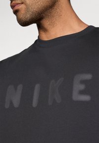 Nike Performance TANK - T-shirt de sport - black/noir - ZALANDO.FR