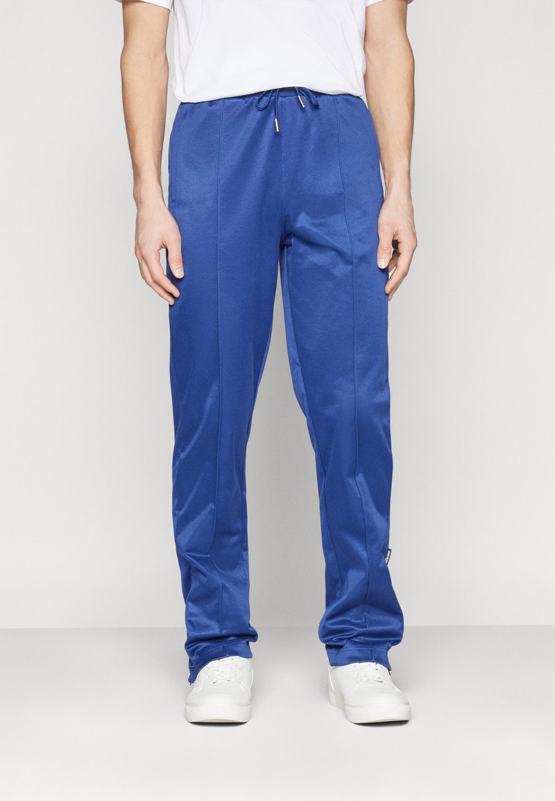 Ellesse SALINO TRACK PANT UNISEX - Pantalon de survêtement - navy/bleu marine - ZALANDO.FR