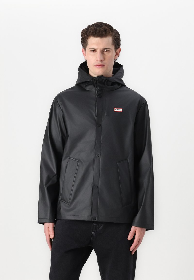 Hunter ORIGINAL IZZY UNISEX - Waterproof jacket - black - Zalando