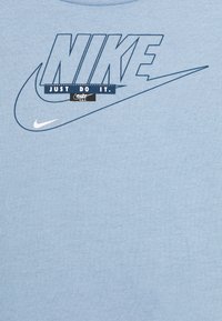 Nike Sportswear CLUB PANT SET - T-shirt à manches longues - court blue ...