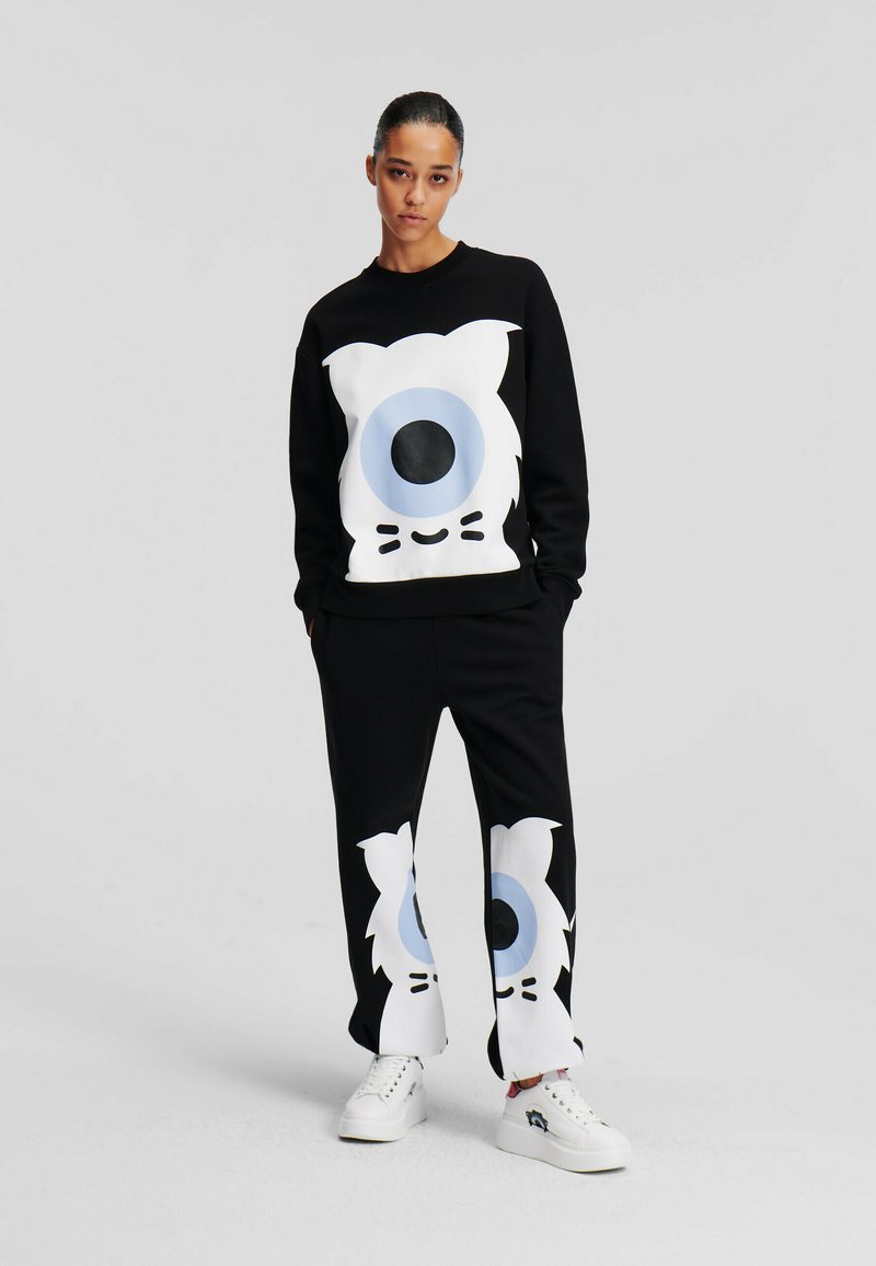 KARL LAGERFELD x DARCEL DISAPPOINTS RELAXED - Tracksuit bottoms - black ...