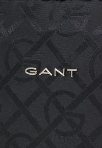 GANT G-PATTERN CROSSBODY BAG UNISEX - Umhängetasche - ebony black ...