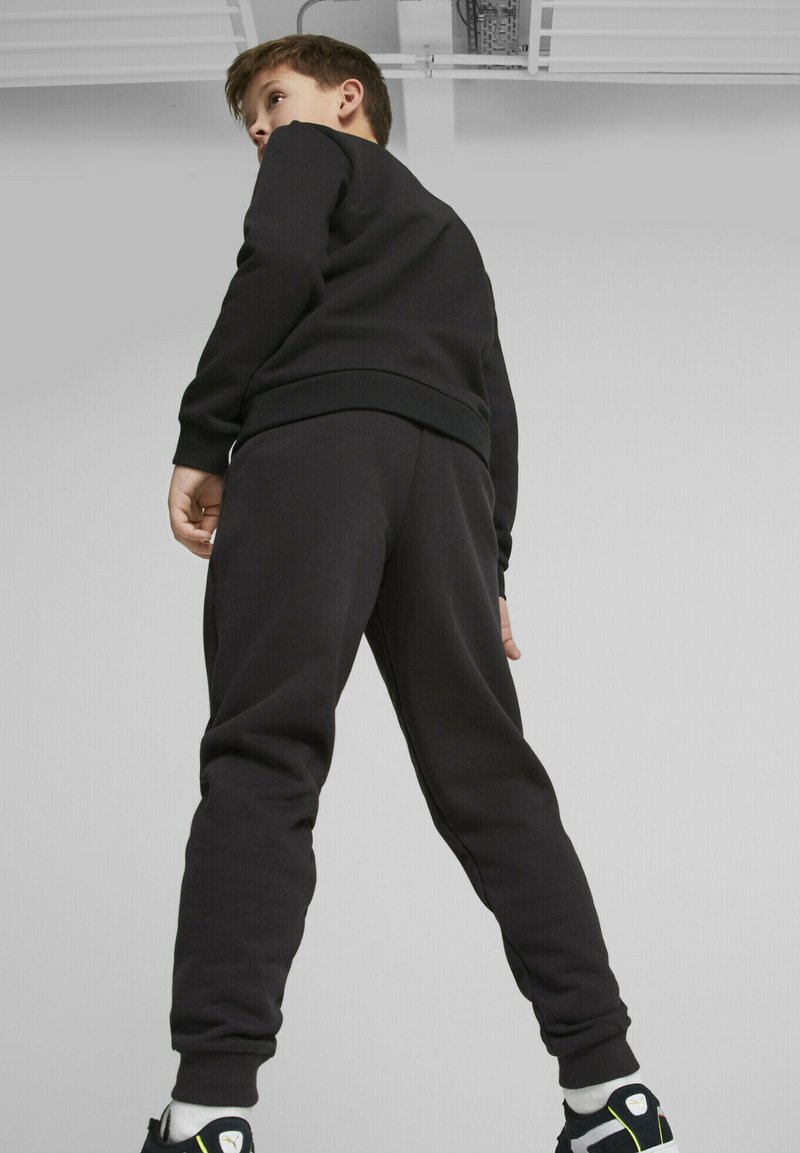 Puma ESSENTIALS TWO-TONE LOGO JUGEND TRAININGS - Jogginghose - schwarz ...