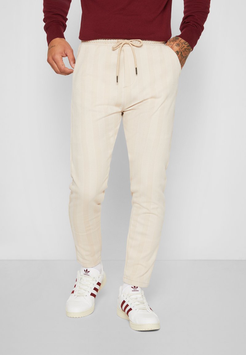 Denim Project Spodnie materiałowe/mleczny - Zalando.pl