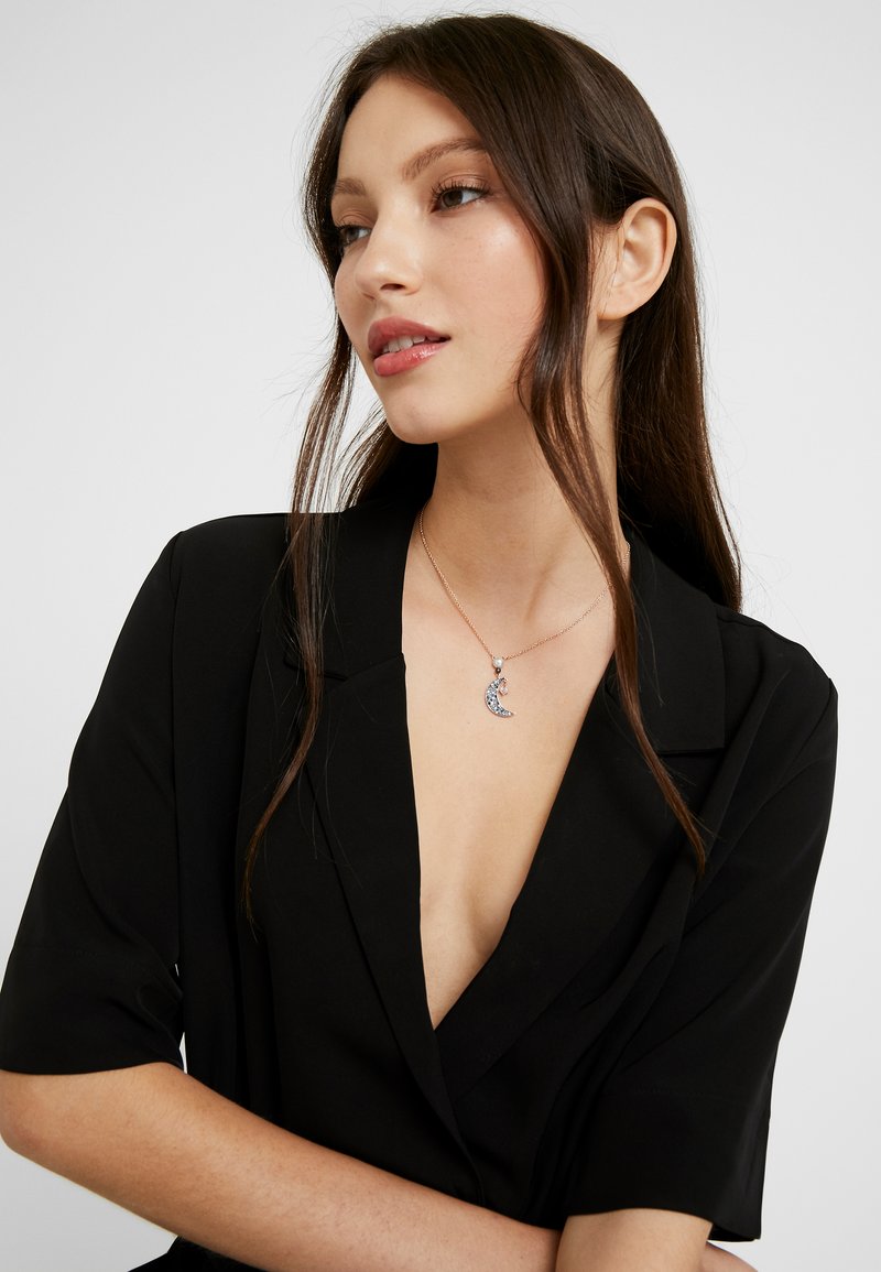 Swarovski SYMBOL PENDANT - Necklace - dark multi/gold-coloured - Zalando.ie