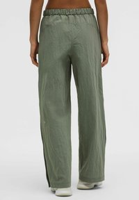 lululemon Crinkle Mid-Rise Wordmark - Trousers - willow leaf fog green ...