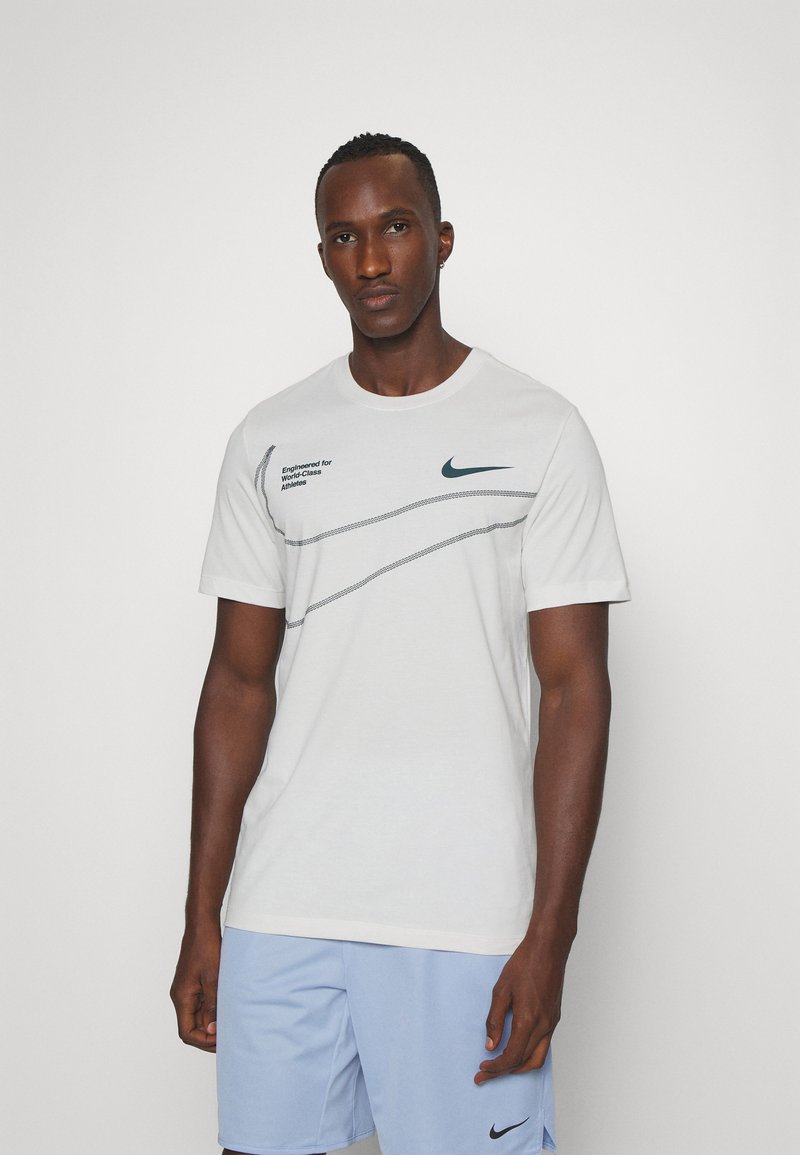 Nike Performance T-shirts print - phantom/lysegrå - Zalando.dk