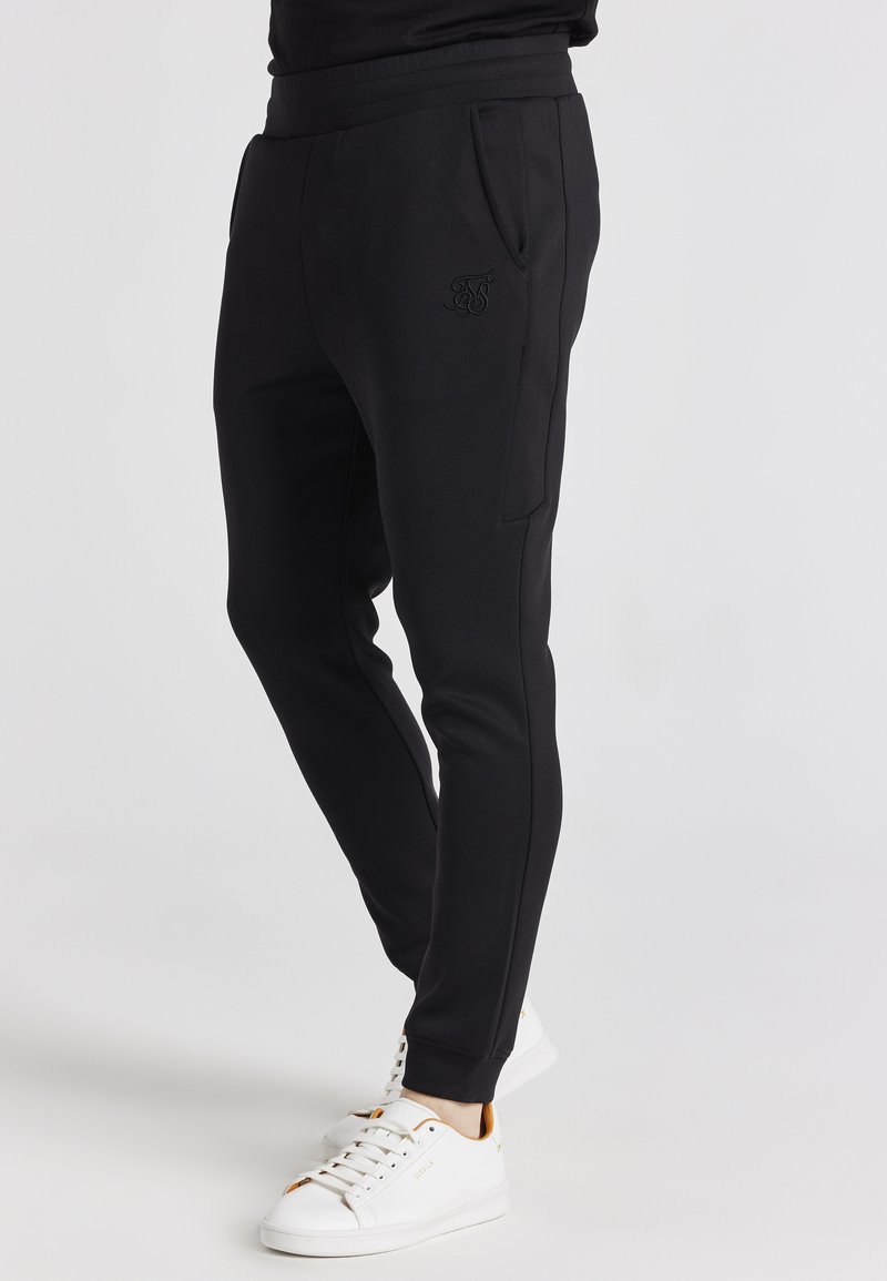 SIKSILK EMBROIDERED PANEL CUFFED - Tracksuit bottoms - black - Zalando.ie