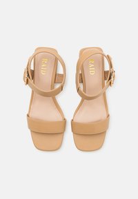 RAID QLINO - Sandały/beżowy - Zalando.pl