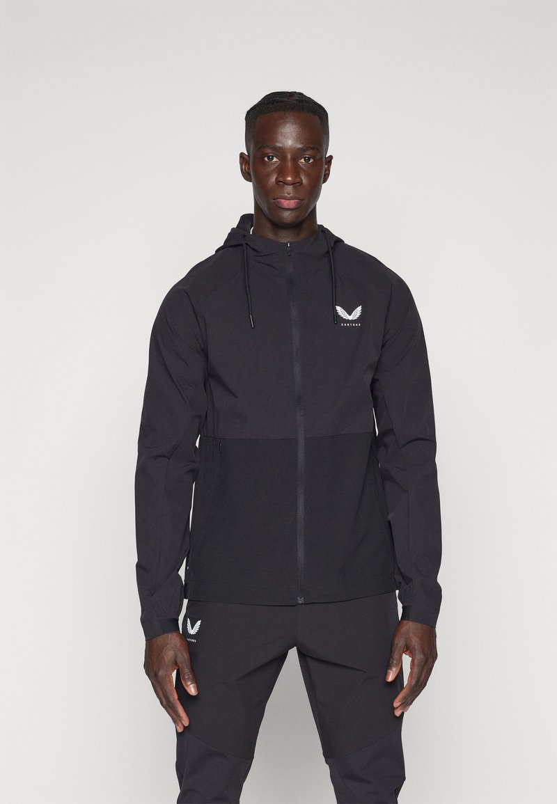 Castore LIGHTWEIGHT JACKET - Trainingsvest - black/zwart - Zalando.nl