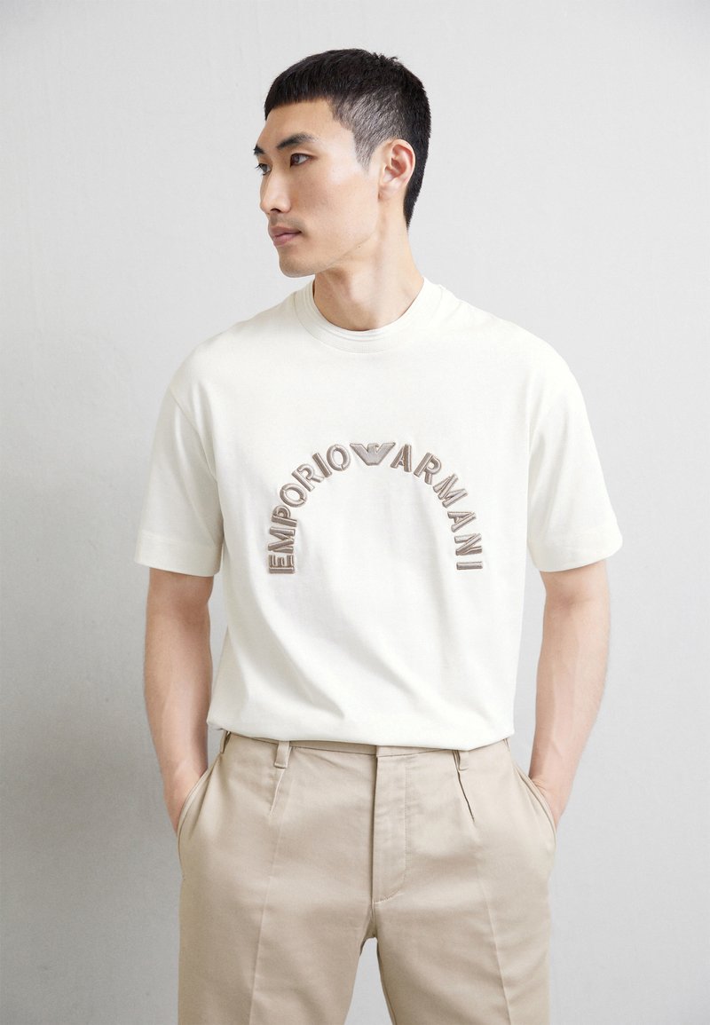 Emporio Armani Print T-shirt - vanilla/off-white - Zalando.co.uk
