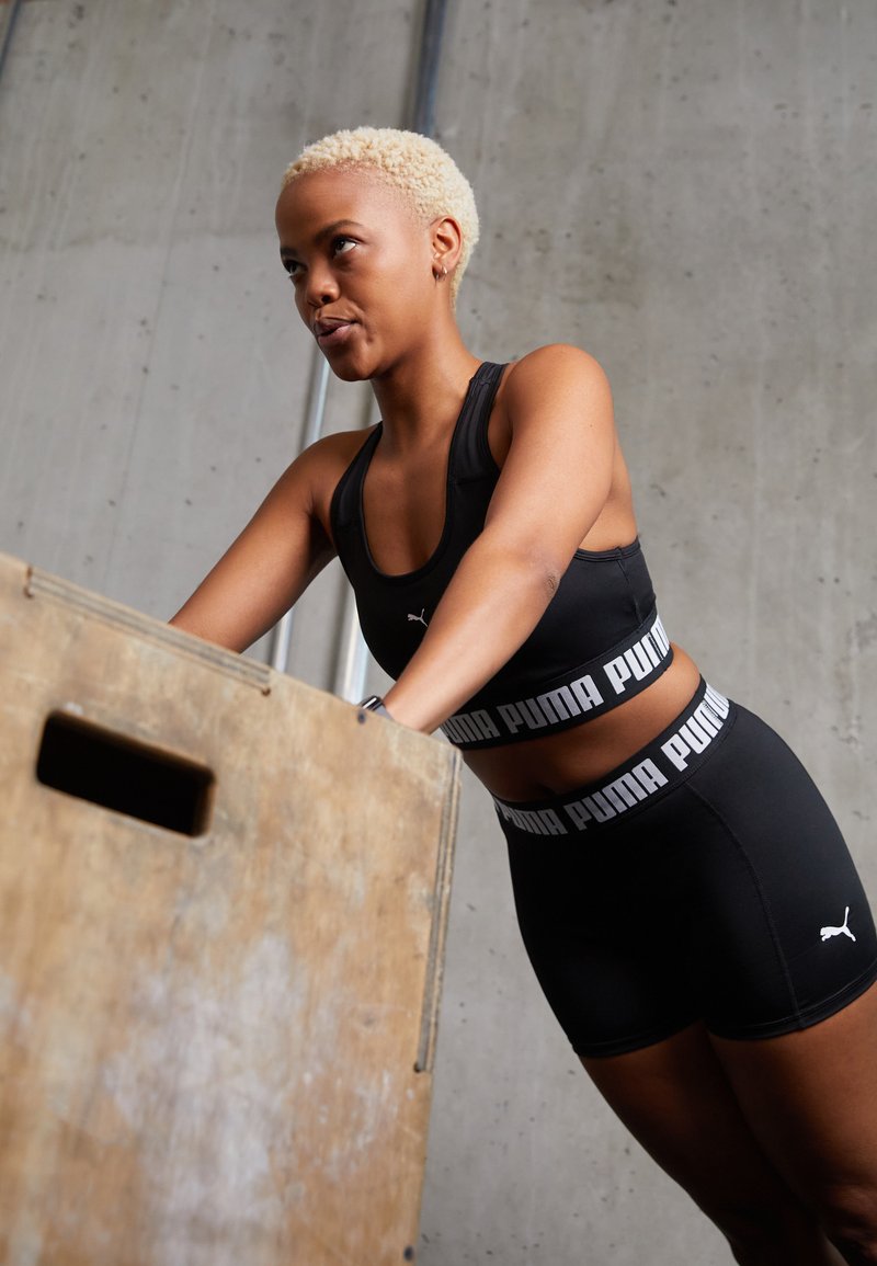 Puma TRAIN STRONG SHORT - Legging - puma black/zwart - Zalando.nl