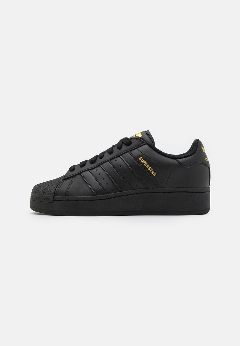 adidas Originals SUPERSTAR XLG - Sneaker low - core black/gold metallic ...