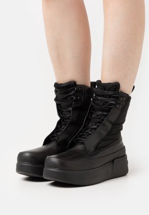 Tamaris Botas para la nieve - black leather/negro - Zalando.es