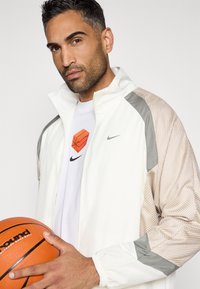 Nike Performance ICON - Training jacket - sail/cream/dark stucco/off ...