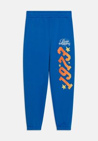 Puma BASKETBALL SWISH UNISEX - Jogginghose - racing blue/blau - Zalando.at