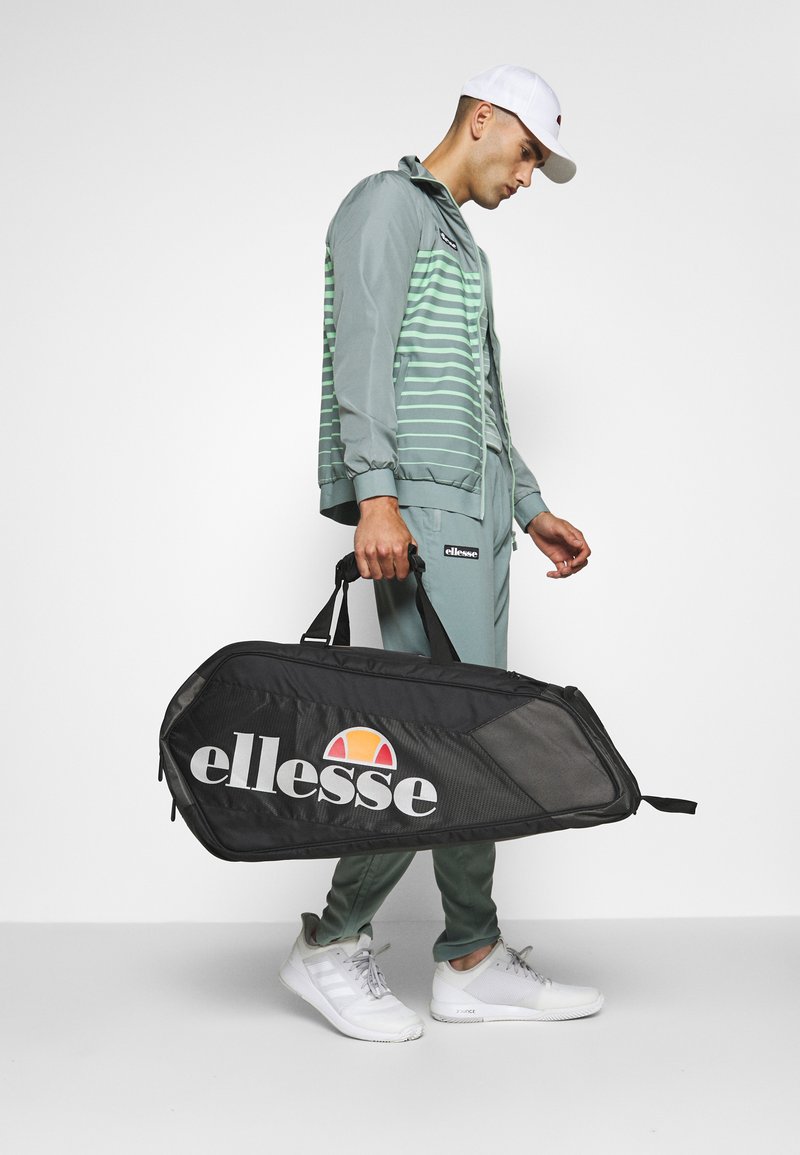Ellesse BOLINO - Racket bag - black - Zalando.ie
