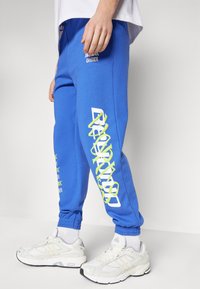 YOURTURN UNISEX - Pantalon de survêtement - blue/bleu - ZALANDO.FR