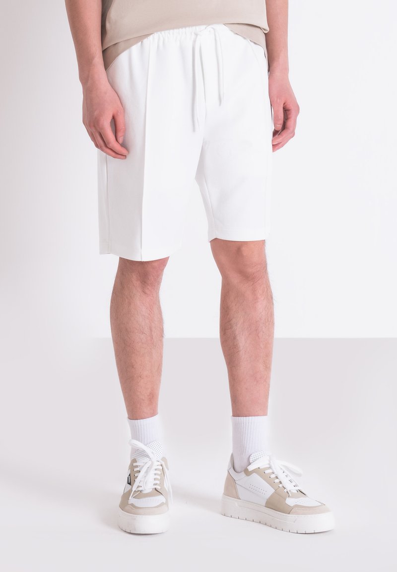 Antony Morato WITH LOGO PLAQUE - Pantalon de survêtement - cream/beige - ZALANDO.FR