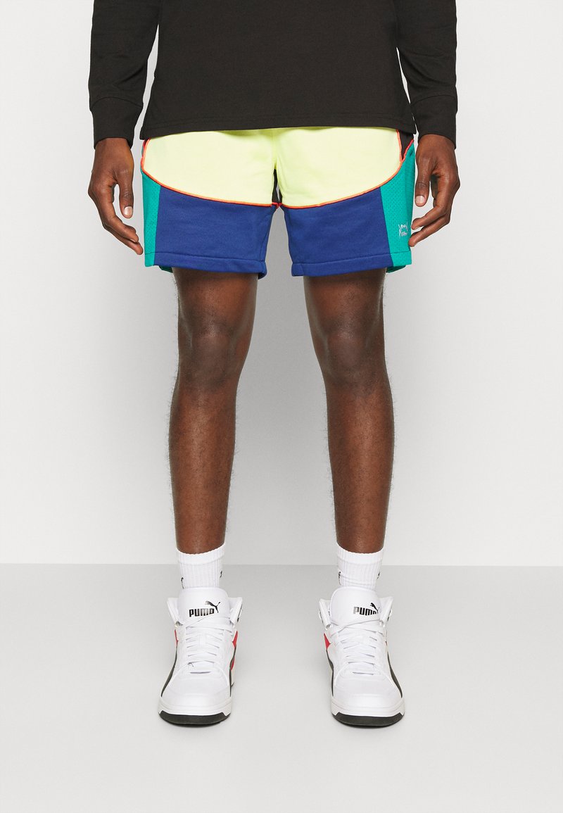 Puma DROP STEP SHORT - Sports shorts - black/fresh yellow/black ...