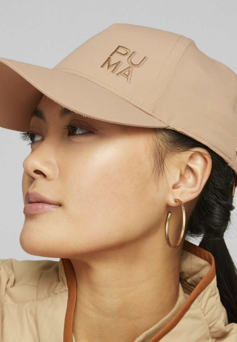 Puma INFUSE PONYTAIL - Cap - dusty tan/beige - Zalando
