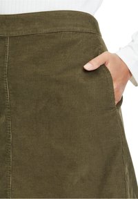 Cartoon MIT EINGRIFFTASCHEN - A-Linien-Rock - dunkelgrün/grün - Zalando.de