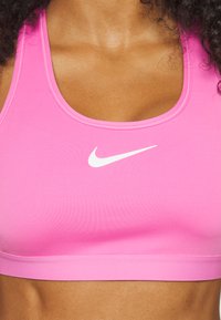 Nike Performance Sport-BH mit starker Stützkraft - playful pink/pink ...
