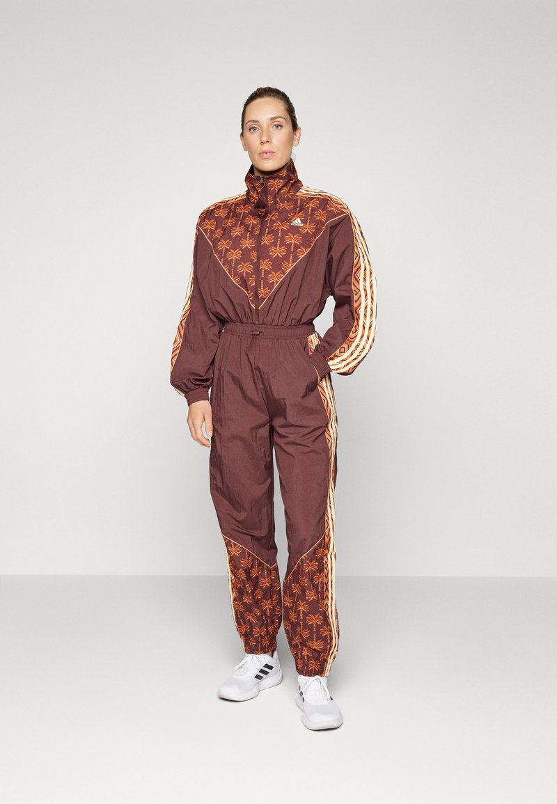 adidas Sportswear ADIDAS FARM RIO PREMIUM JUMPSUIT - Buksedragter ...