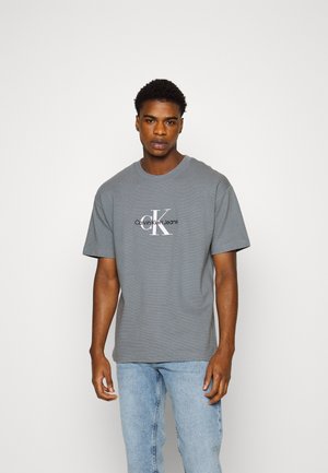 Calvin Klein Jeans MONOLOGO TEE UNISEX - T-Shirt print - black/schwarz - Zalando.at