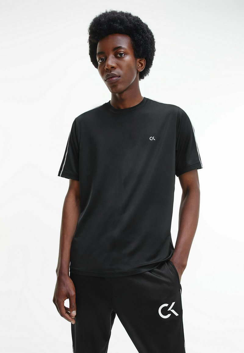 Calvin Klein Performance T-Shirt print - ck black/bright white/schwarz ...