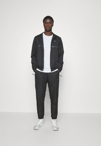 EA7 Emporio Armani VENTUS TRACKSUIT - Survêtement - black/noir - ZALANDO.FR