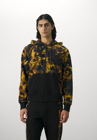 Versace Jeans Couture CONTRAST - Zip-up sweatshirt - black/gold ...