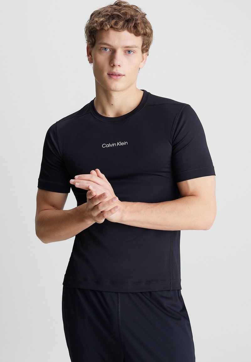 Calvin Klein Performance GYM - Sports T-shirt - black beauty/black ...