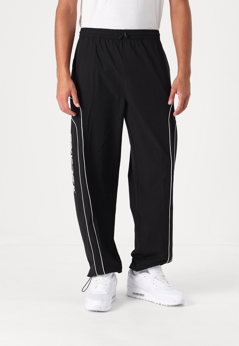 Love Scars COACH TRACKPANTS UNISEX - Trousers - black - Zalando
