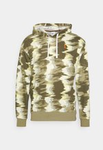 Nike Performance M NKCT DF FLC HERITAGE OZ HD - Jersey con capucha ...