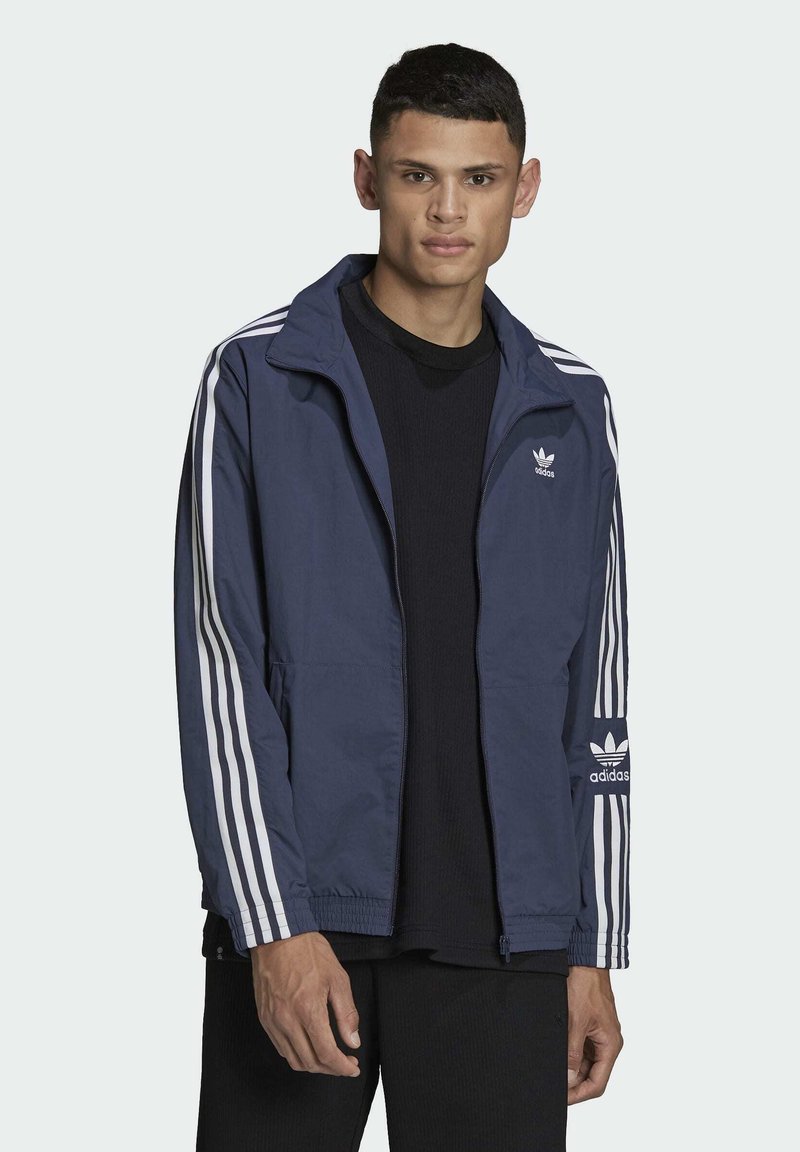 adidas Originals LOCK UPTT - Verryttelytakki - blue/tummansininen ...