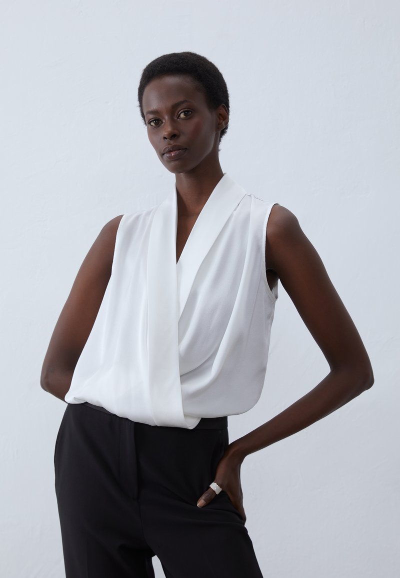 Anna Field Pluus - off-white/valkjas - Zalando.ee