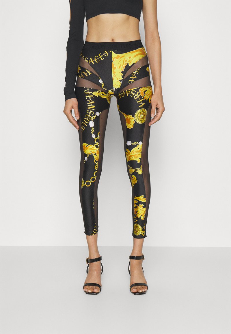 Versace Jeans Couture PRINT CHAIN - Leggings - Trousers - black/gold ...
