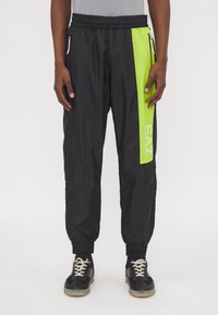 EA7 Emporio Armani TROUSER - Pantalon de survêtement - nero/noir - ZALANDO.FR