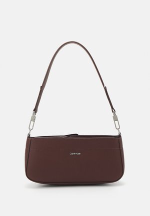 Calvin Klein BUSINESS SHOULDER BAG SAFFIANO - Handbag - dk ecru/sand ...