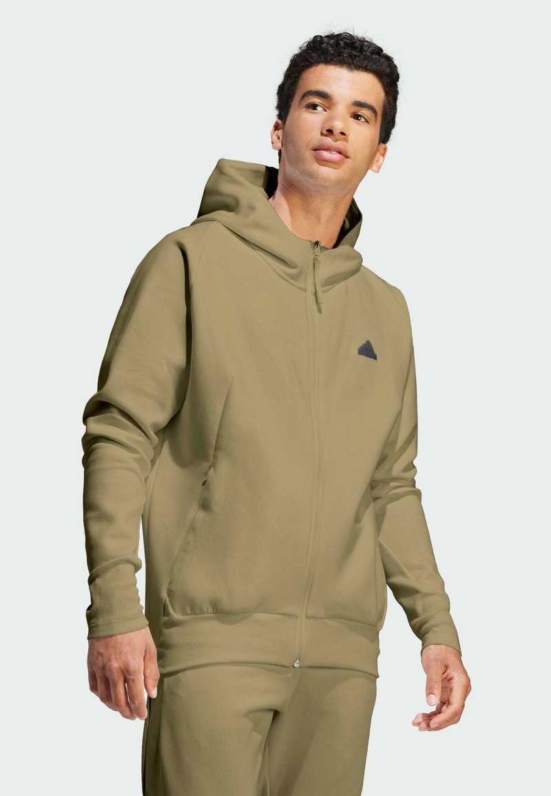 adidas Sportswear Z.N.E PREMIUM - Zip-up sweatshirt - olive strata ...
