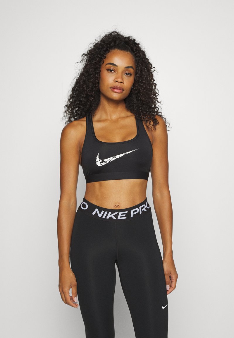 Nike Performance Sports-BH'er med let støtte - black/white/sort ...