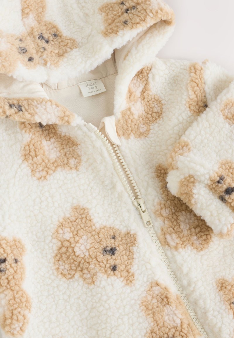 Next REGULAR FIT - BEAR ALL OVER PRINT BORG - Overal - natural/béžová ...