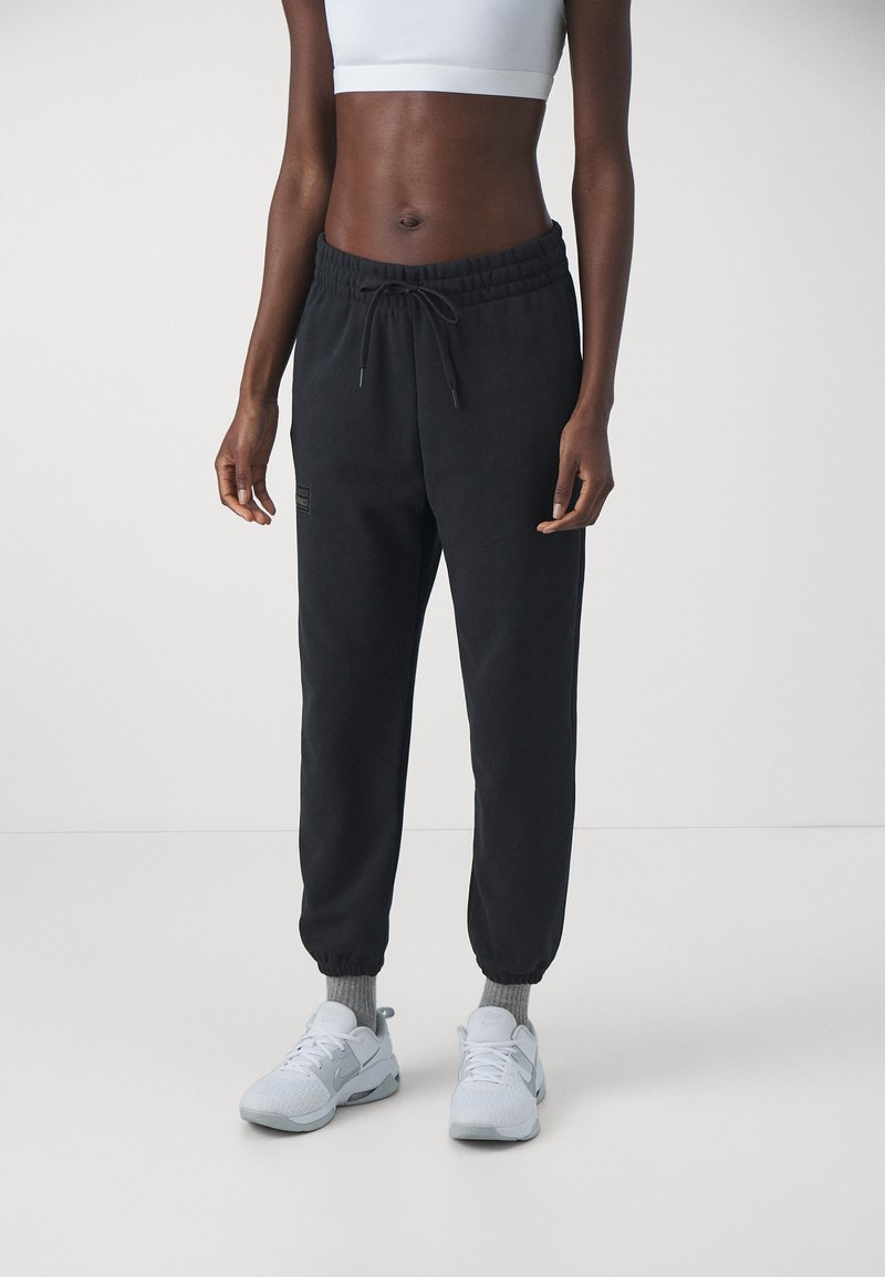 Under Armour ROCK TERRY - Jogginghose - black/schwarz - Zalando.at