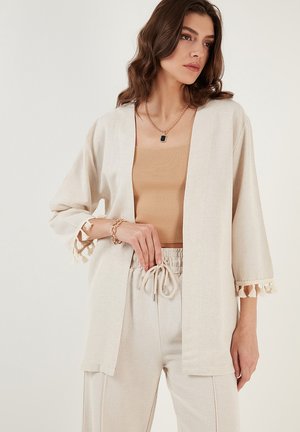 Naisten neuletakit netistä – Zalandon neuletakkivalikoima - Sivu 3