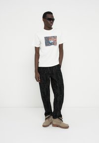 Former TURMOIL DISTEND PANT - Τζιν χαλαρής εφαρμογής - black/μαύρο ...