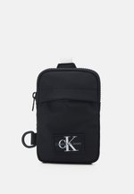 Calvin Klein Jeans CROSSBODY BAG UNISEX - Sac bandoulière - black/noir ...