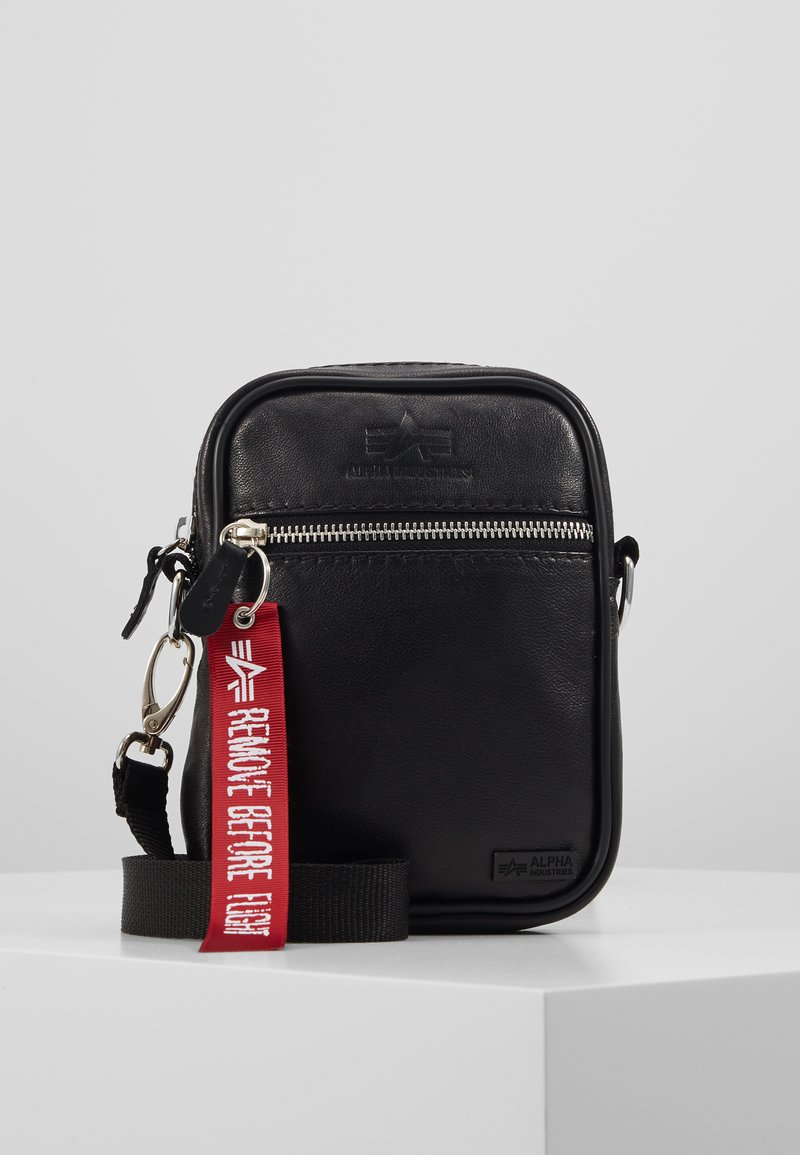 Alpha Industries UTILITY BAG - Cross body bag - black - Zalando.co.uk